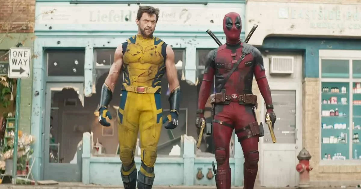 Watch Hugh Jackman's giddy reaction to watching the final fight sequence of DEADPOOL and ...